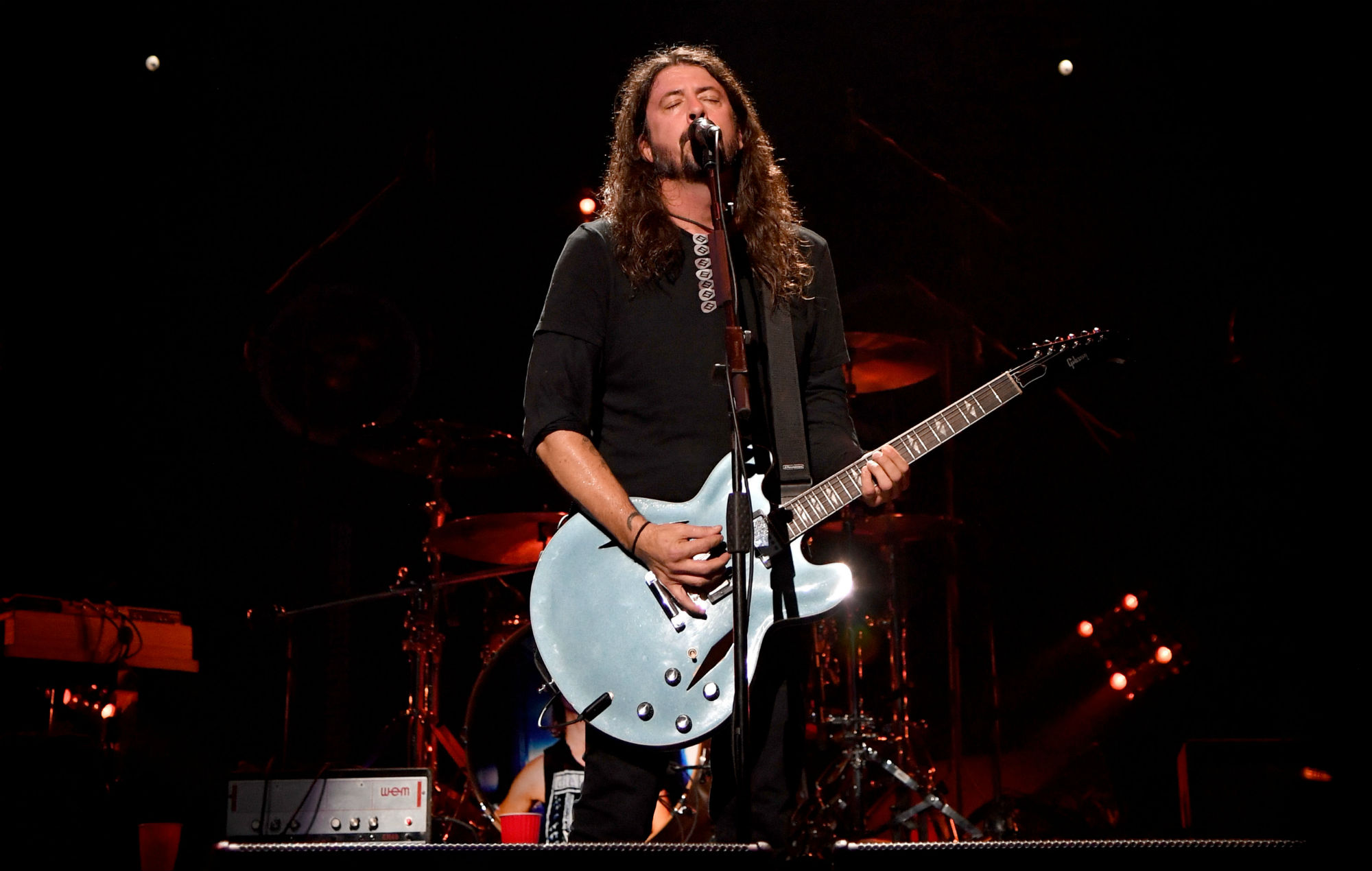 Watch Dave Grohl perform 'Show Me How to Live' with Audioslave at Chris ...