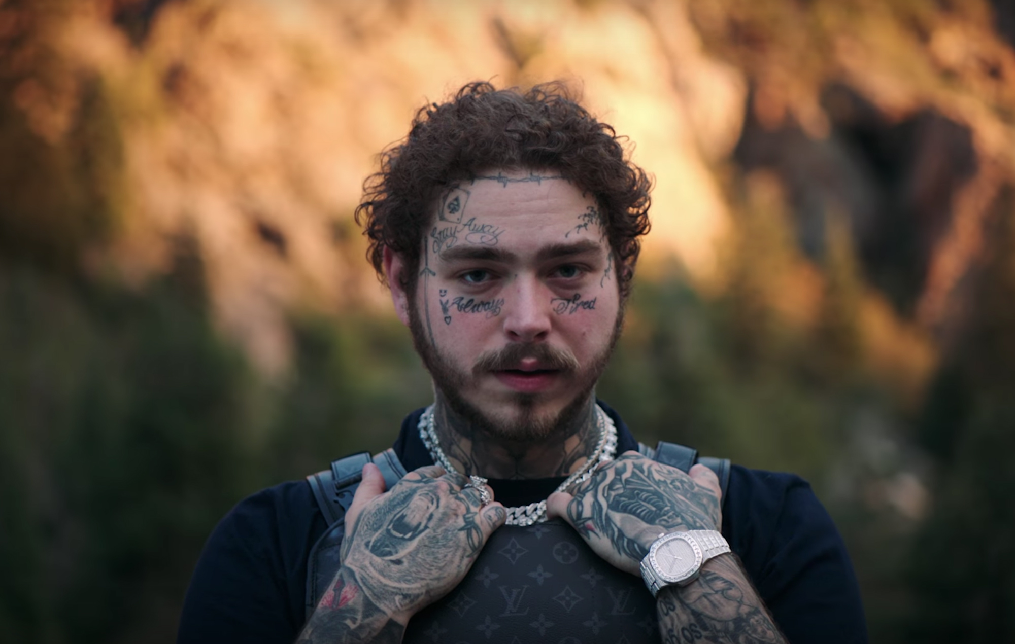 Post Malone stunts in the mountains in his ‘Saint-Tropez’ video